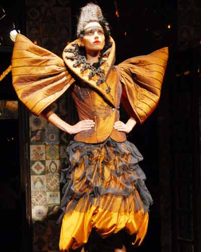 A model presents a creation by designer Rohit Bal during Day 5 of Delhi ...