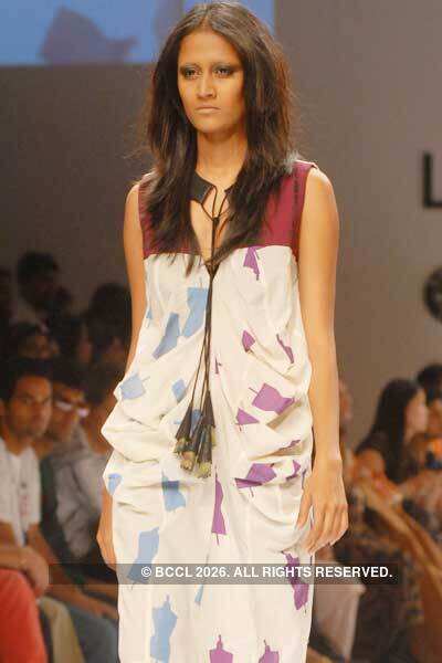 Designer Kallol Datta (C) on the ramp with models after presenting his ...