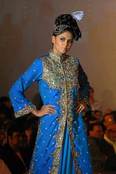 A model showcases Rohit Verma's creation at the fashion show at J ...