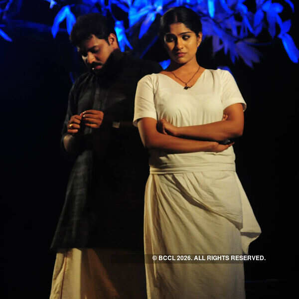 An artist performs during the play