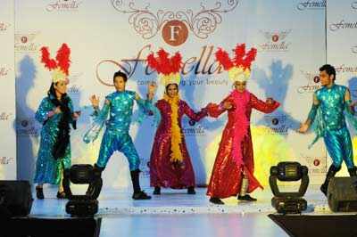 A participant walks the ramp during the fashion round of Femella's ...