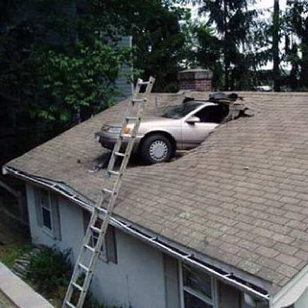 We have no idea how did this car fell on the roof of a house