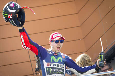 Lorenzo wins to close gap on Rossi in title race