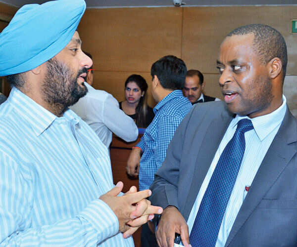 RS Jaura (L) with Ernest Rwamucyo during the event - Photogallery