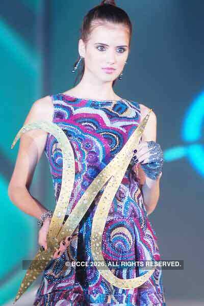 Models present the creations by designer Neeta Lulla during a fashion ...