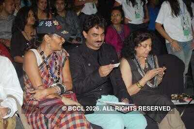 Sapna Kumar displays a creation by designer Rocky S during the Day 1 of ...