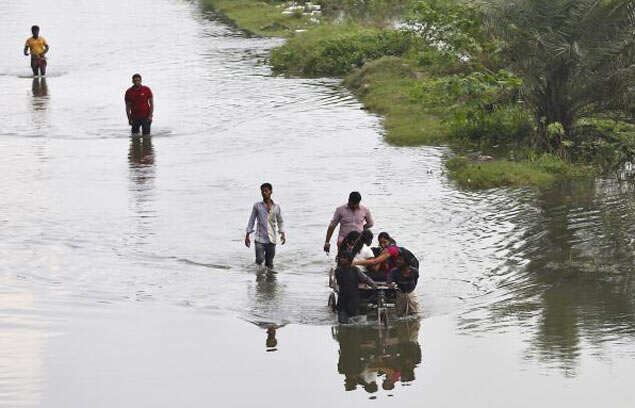 Chennai flood: Braving chest-deep waters to flee or rescue relatives