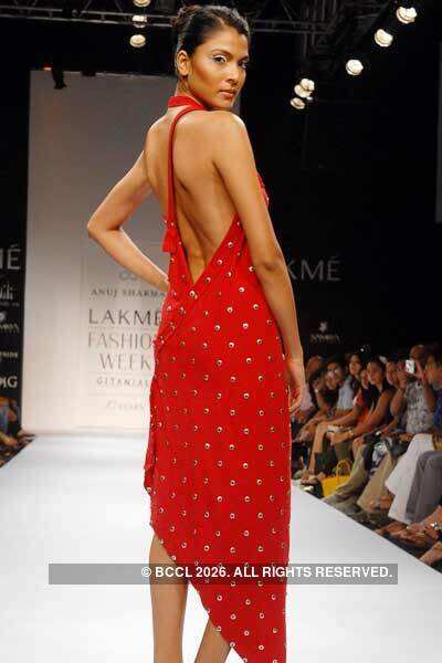 Sucheta displays a creation by designer Anuj Sharma on the Day 2 of ...