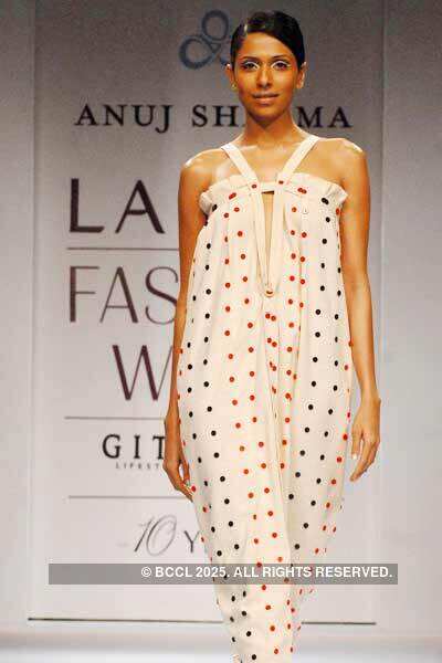 Sucheta displays a creation by designer Anuj Sharma on the Day 2 of ...