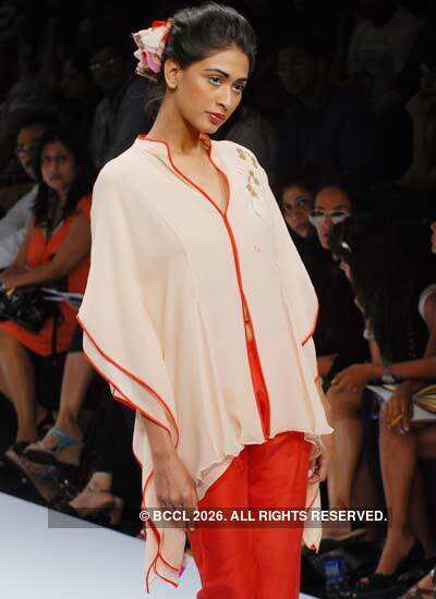 A model displays a creation by designers Nikasha and Nachiket Barve on ...
