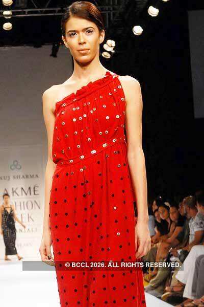 Sucheta displays a creation by designer Anuj Sharma on the Day 2 of ...