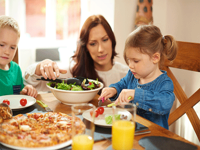 To eat less, serve food in small portions on large tables