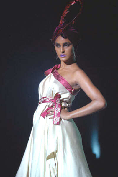 Nethra Raghuraman showcases a creation by designer Suneet Varma during ...