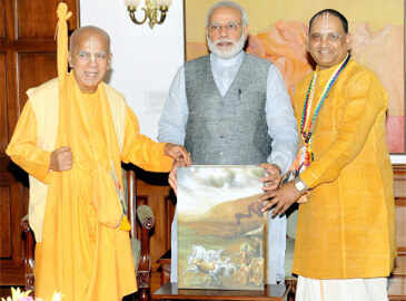 PM Modi meets CISCO chairman, ISKCON leader