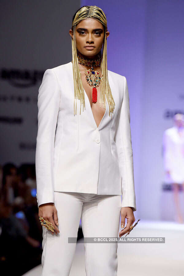 A model walks the ramp for designer Nitya on Day 3 of the Amazon India ...
