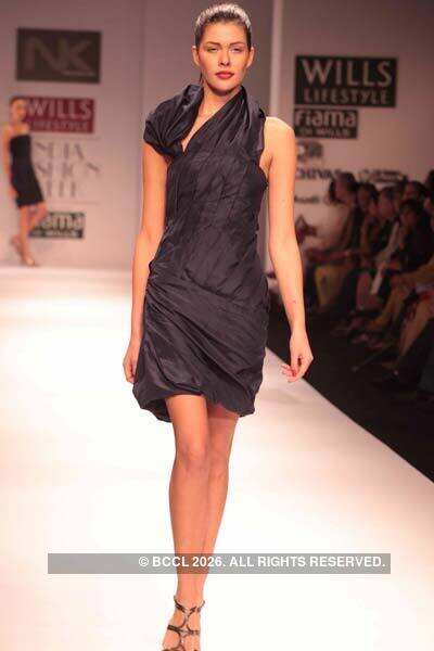 Camilla presents a creation by designer Narendra Kumar on Day 1 of ...