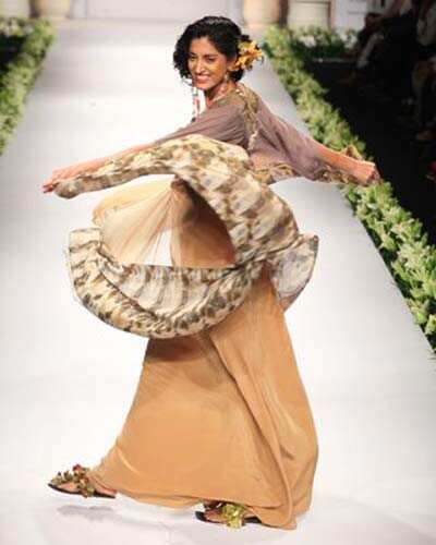 Tania Sachdev presents a creation by designer duo Ashima and Leena on ...