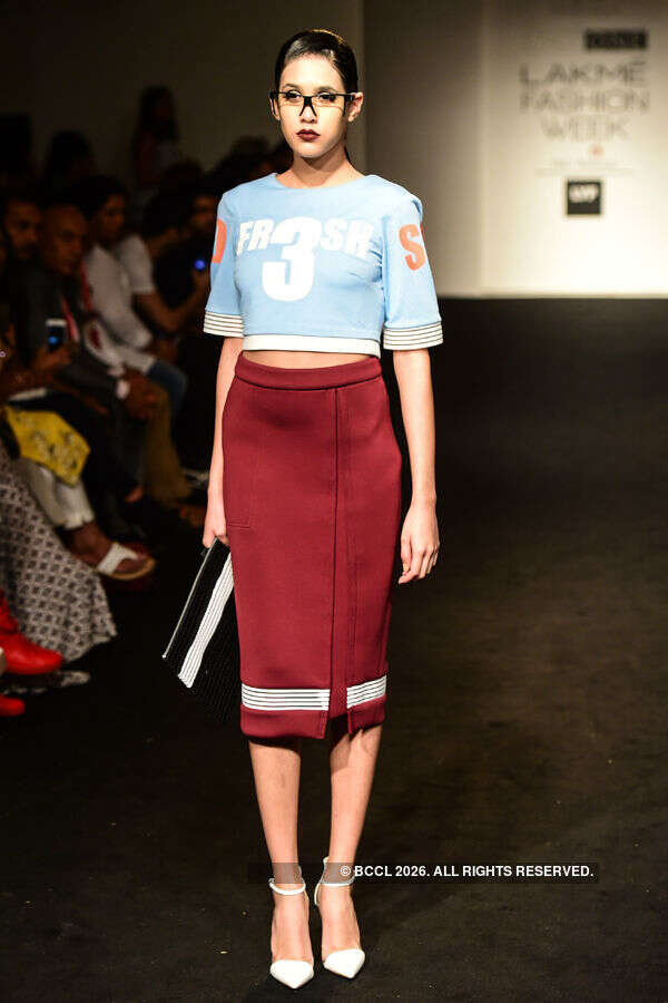 A model showcases a creation by designer Kanika Goyal on Day 1 of the ...