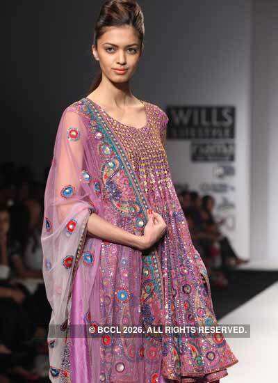 A model presents a creation by designer Jaya Rathore on Day 5 of Wills ...