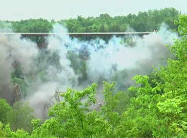 Caught on camera: Controlled explosion brings down NY bridge