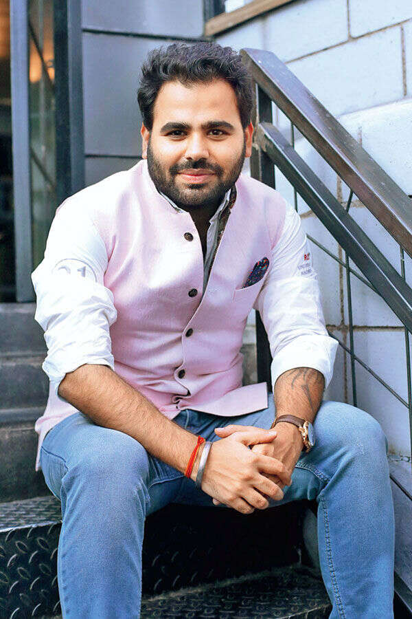 Varun Puri poses during a party at Molecular Air Bar in Gurgaon ...