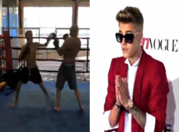 Justin Bieber shows off boxing skills with his personal trainer