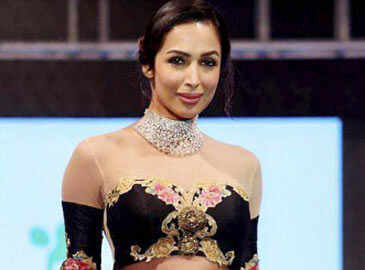 Malaika walks the ramp to support a special cause