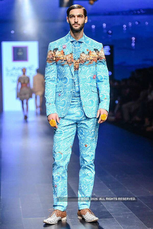 A model showcases a creation by designer Ajay Kumar on Day 5 of the ...