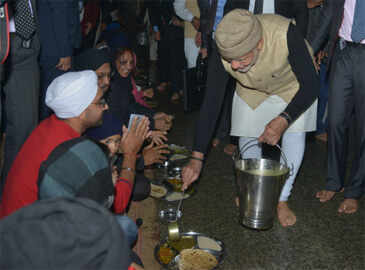 Watch: PM Modi serves ‘langar’ at Golden Temple