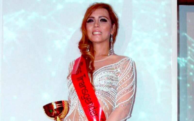 Transgender beauty queen stripped of her crown