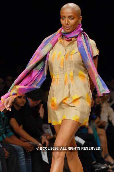 A model walks the runway to showcase a creation by designer Krishna ...