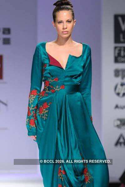 A model presents a creation by designer Jaya Rathore on Day 4 of Wills ...