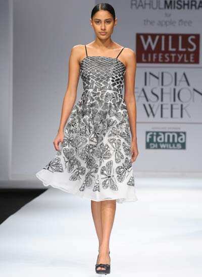 A model presents a creation by designer Rahul Mishra during Wills India ...