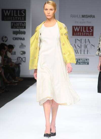A model presents a creation by designer Rahul Mishra during Wills India ...