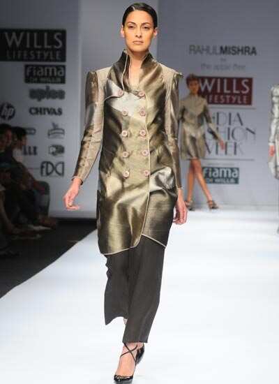 A model presents a creation by designer Rahul Mishra during Wills India ...