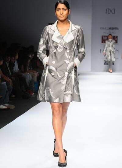 A model presents a creation by designer Rahul Mishra during Wills India ...