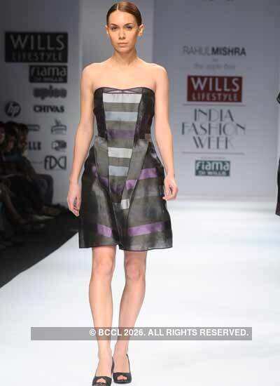 A model presents a creation by designer Rahul Mishra during Wills India ...