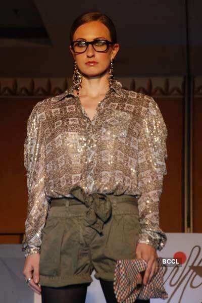 A model walks the ramp to showcase a creation during NIFT annual ...