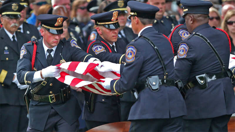 Indianapolis: Large police turnout at slain officer's funeral