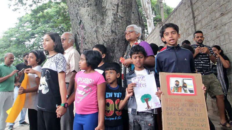 Bengaluru residents form human chain to save trees