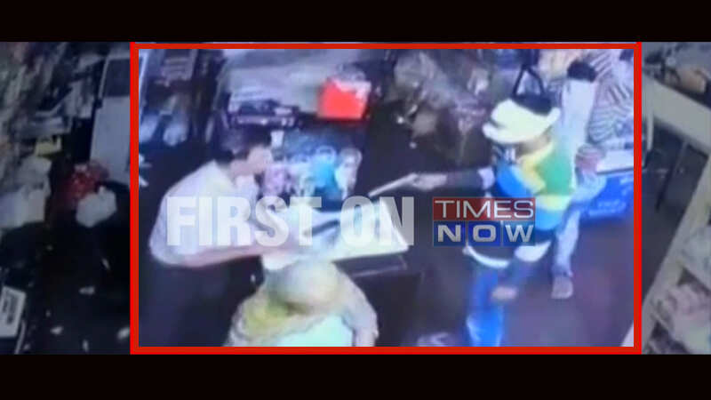 Caught on camera: Shopkeeper fights off armed robbers