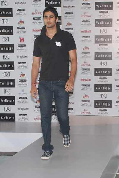 Model walks on ramp during Van Heusen Men's Fashion Week model ...