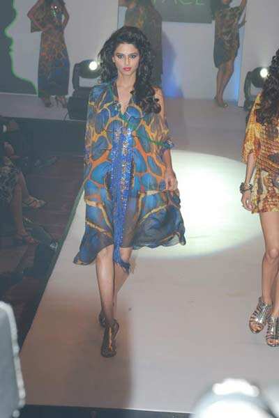 Models walk the ramp during the Oxybleach India's International face ...