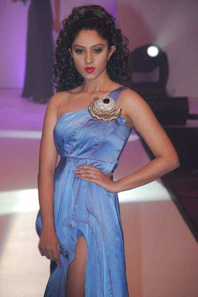 Models walk the ramp during the Oxybleach India's International face ...