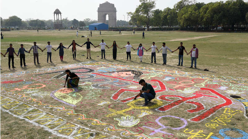 DU students make ‘Rape Roko’ rangoli to mark Holi