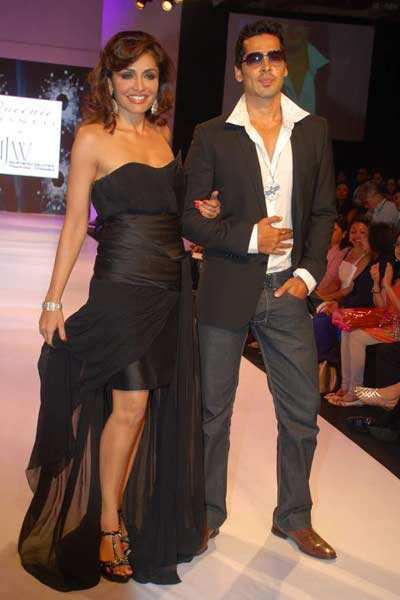 Queenie and Dino Morea walk the ramp during Queenie's show for ...