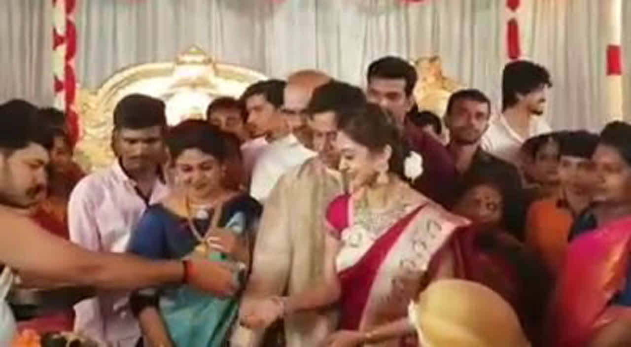 Aishwarya Arjun and her dad Arjun Sarja at Chiru Sarja and Meghana Raj ...