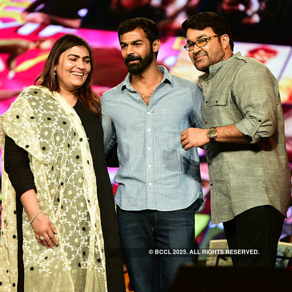 Suchitra Mohanlal, Pranav Mohanlal and Mohanlal share a stage during ...