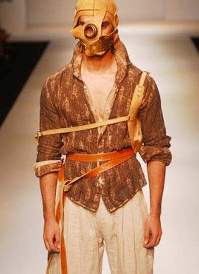 A model presents a creation by designer Samant Chauhan on the Day 1 of ...