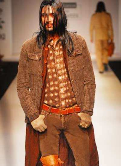 A model presents a creation by designer Samant Chauhan on the Day 1 of ...